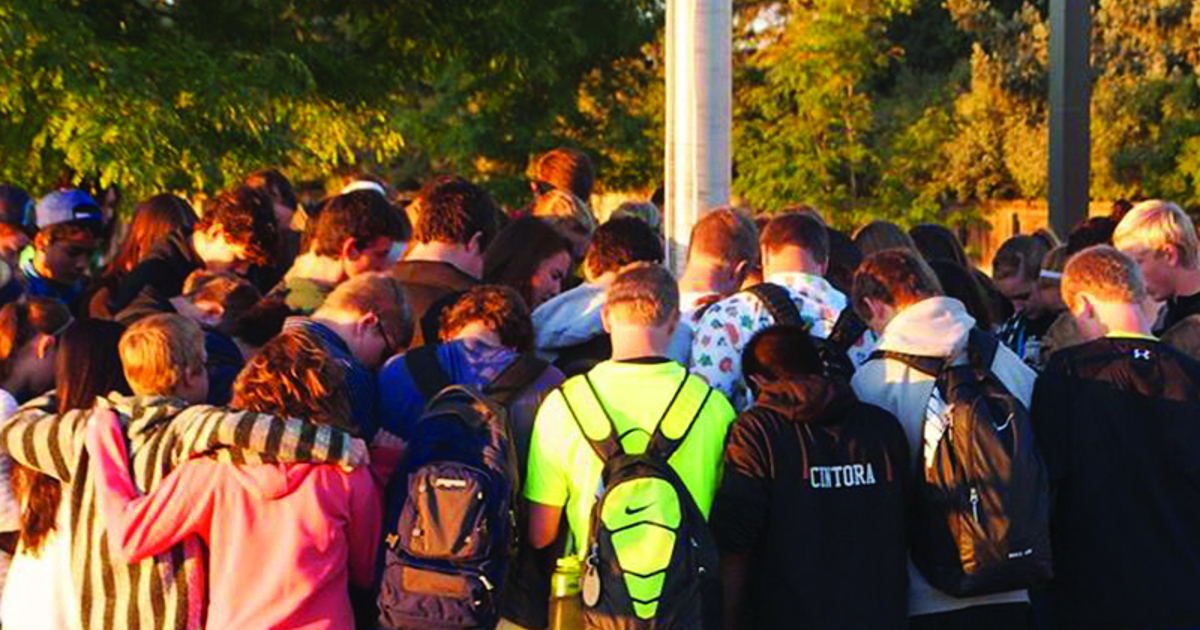 AFN - Students circling for prayer after suffering through pandemic